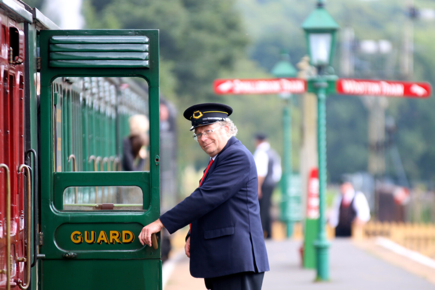 Isle of Wight - IOW Steam Railway - Guard opening train door ©Isle of ...